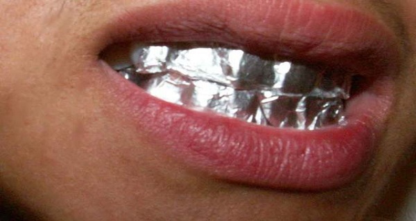 THIS Is What Happens When You Wrap Your Teeth In Aluminum Foil. Genius!